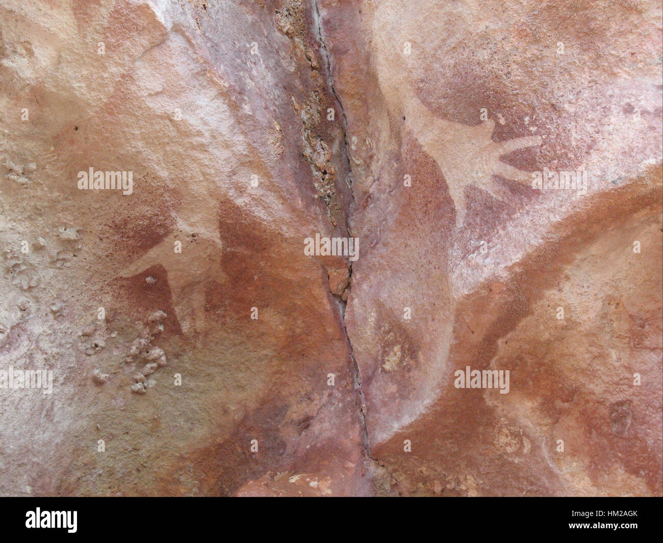 This artwork features hand stencils with a focus on the mutilated ...