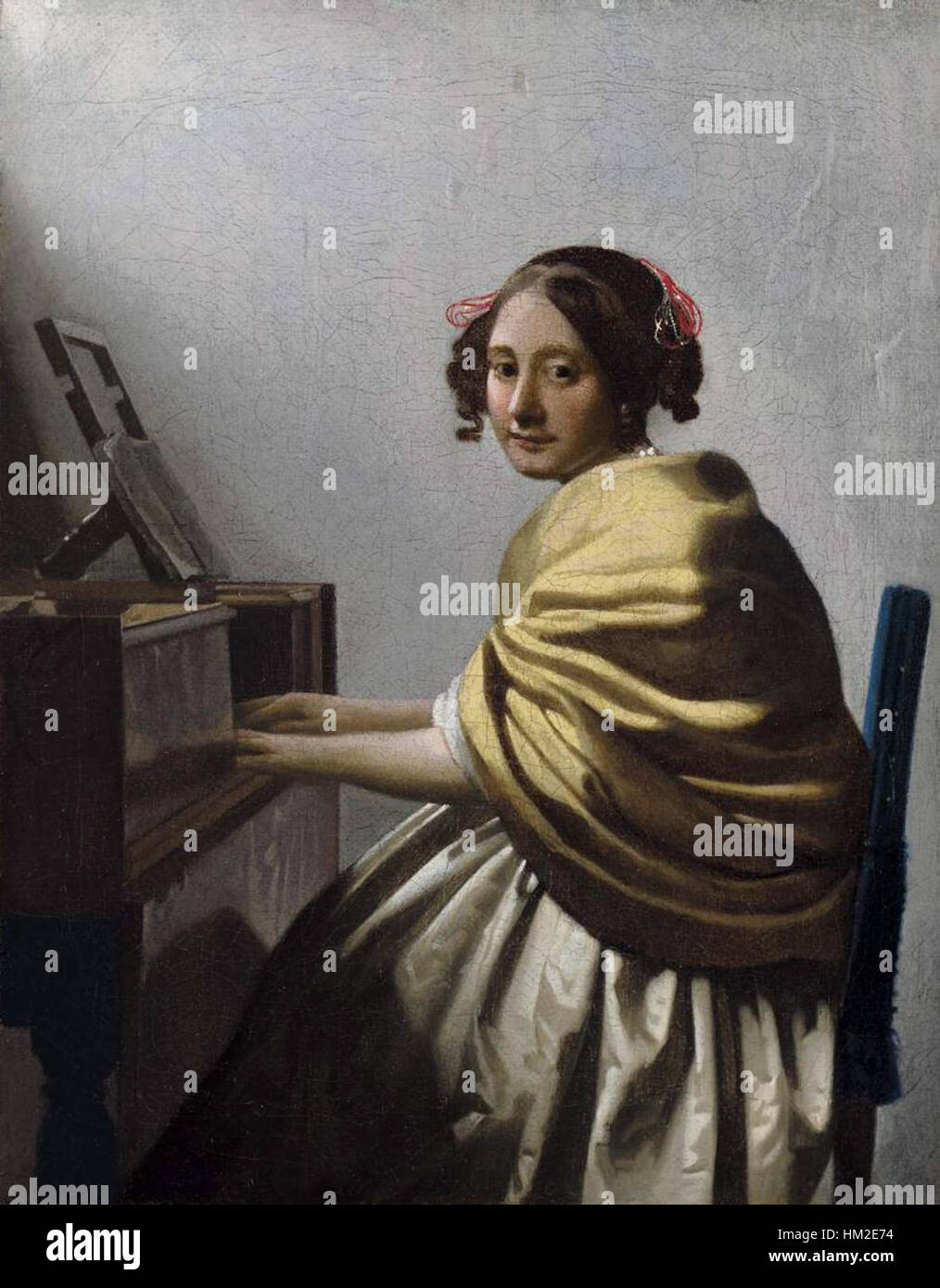 'Young Woman Seated at the Virginals' by Johannes Vermeer is an iconic ...
