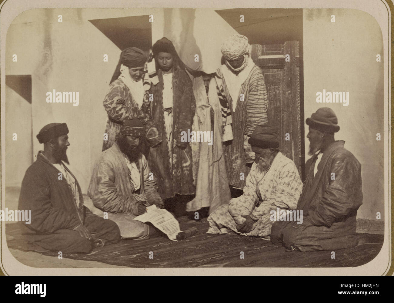 *Jewish Wedding Rituals* shows two men representing the families of the ...