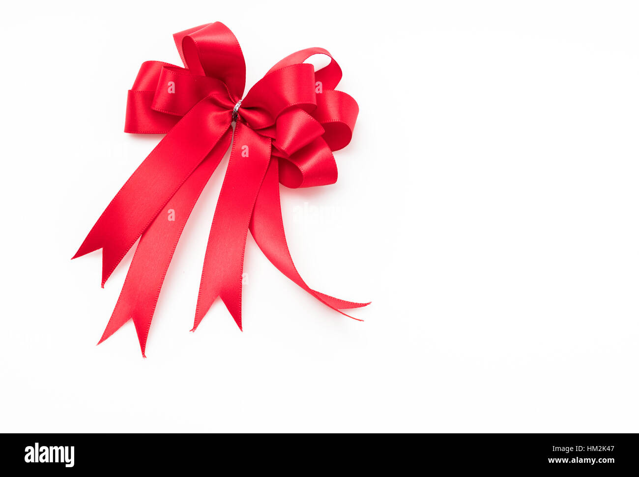 Shiny red ribbon on white background with copy space Stock Photo - Alamy