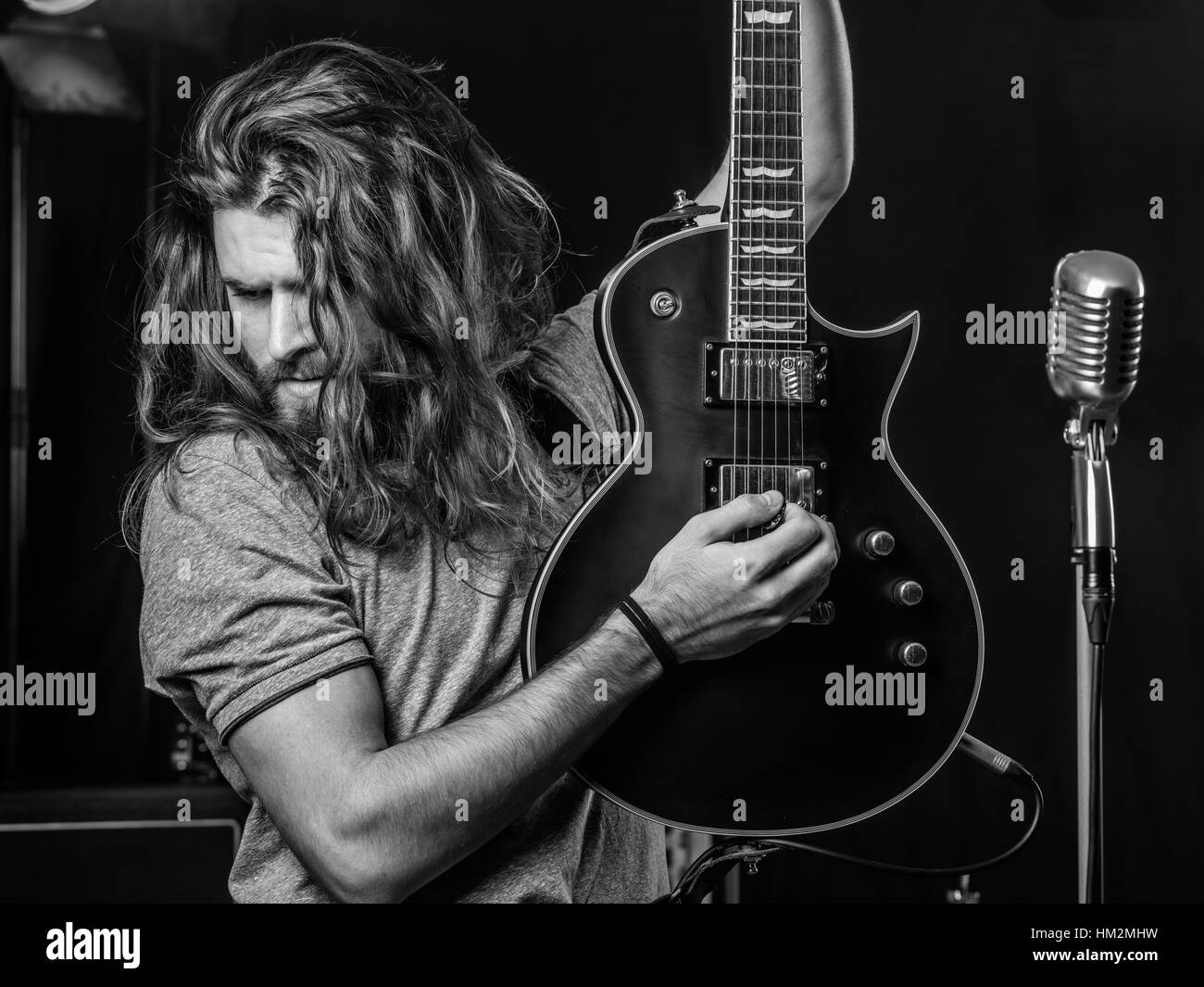 Man singer long hair hi-res stock photography and images - Alamy