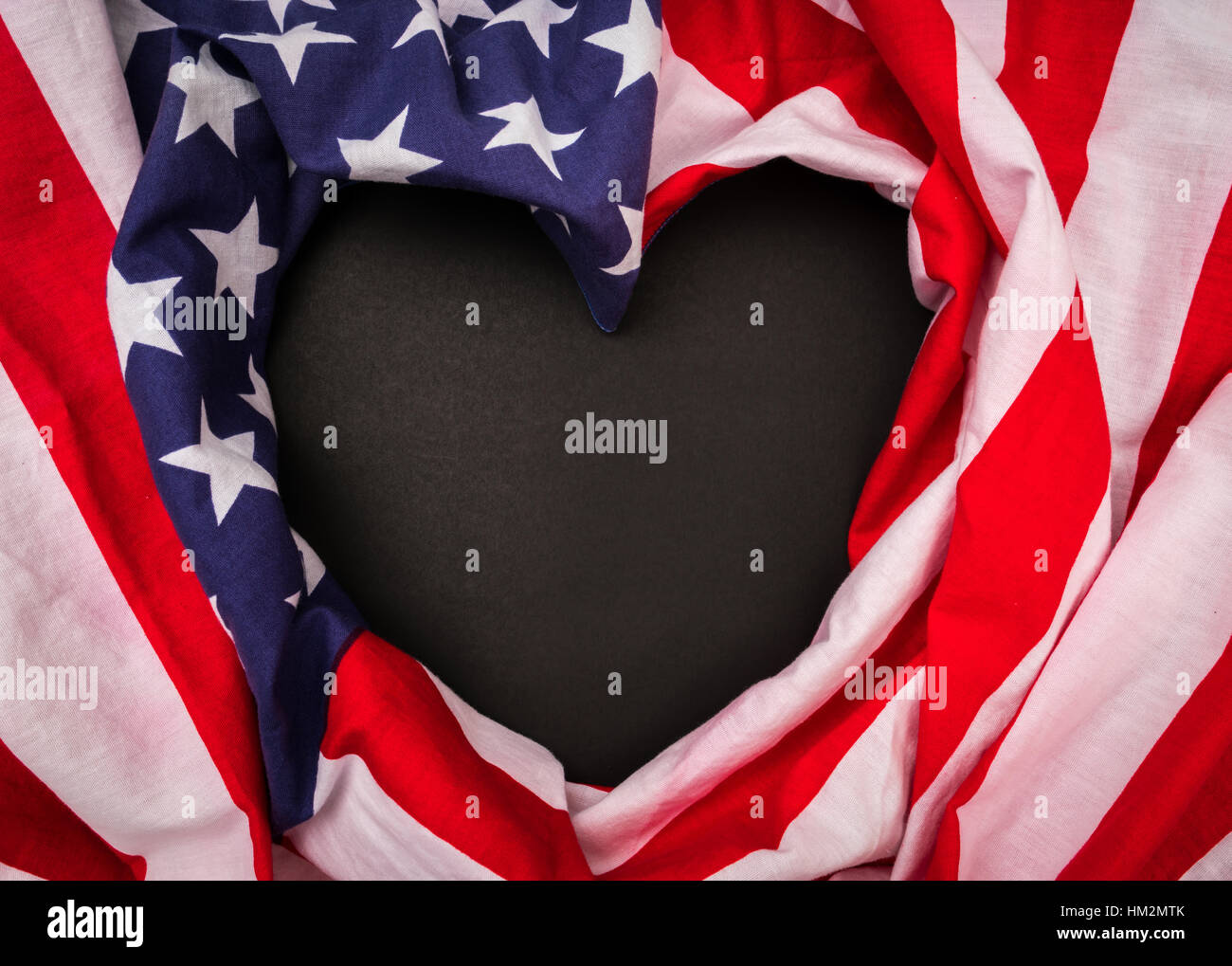 Heart shape American flag on black background Stock Photo - Alamy
