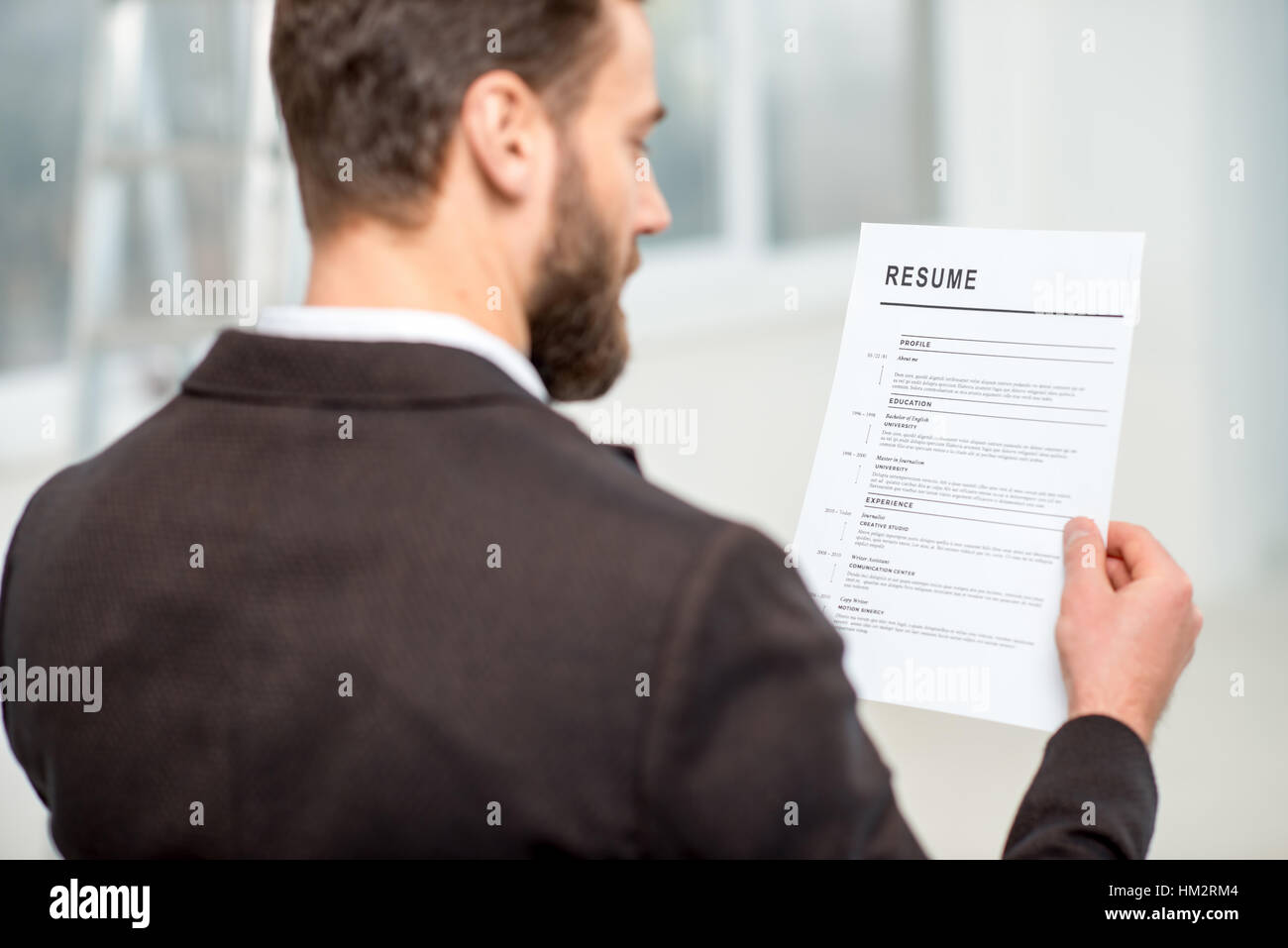 Employer recruiter holding reading hi-res stock photography and images ...