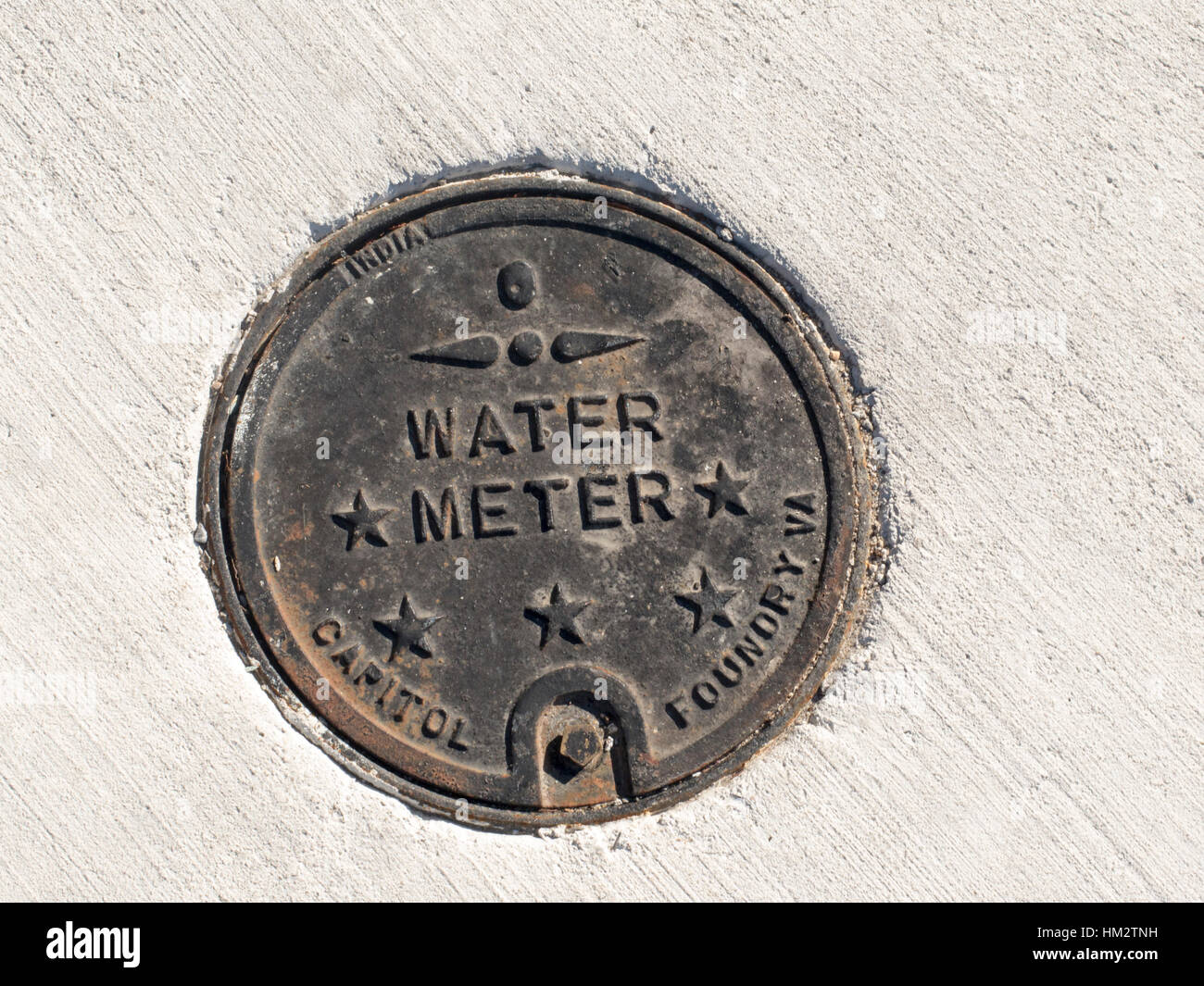 Man hole cover foe water meter Stock Photo - Alamy
