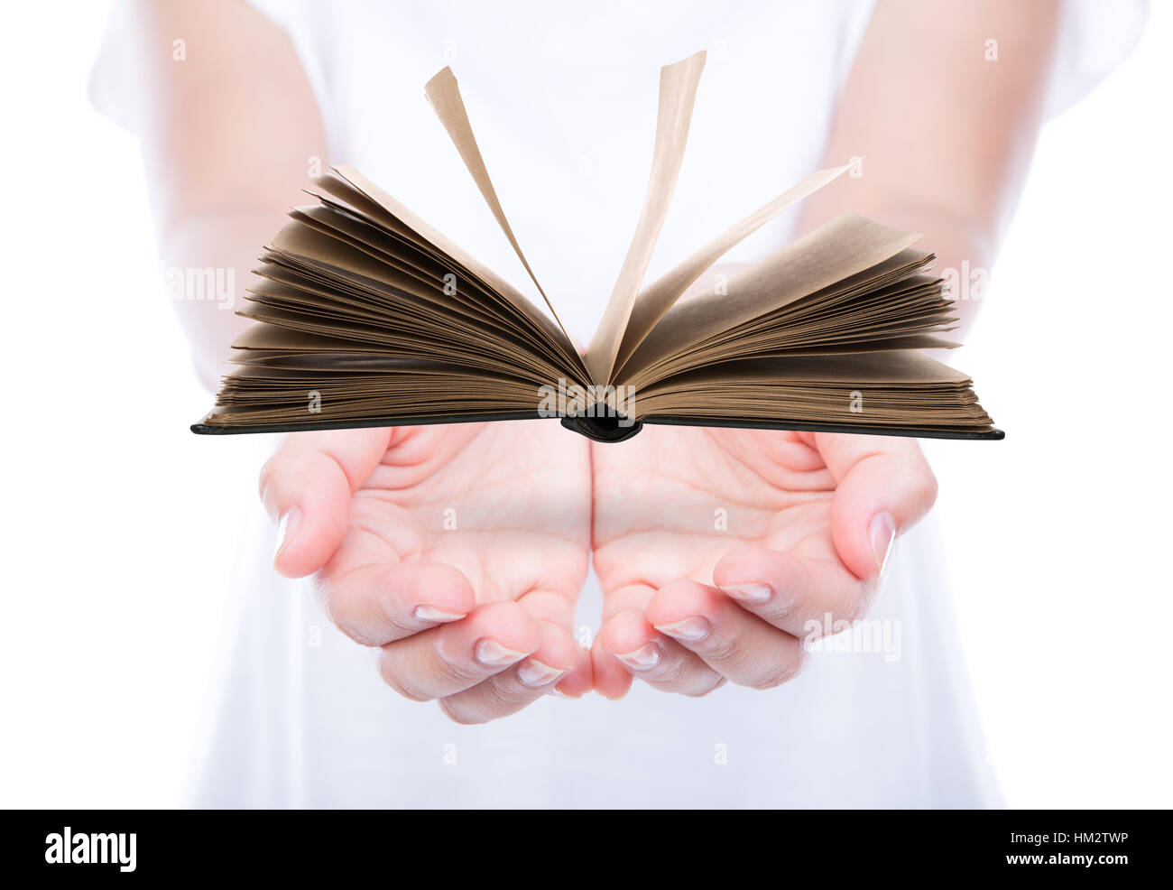 Women hand holding book Stock Photo - Alamy