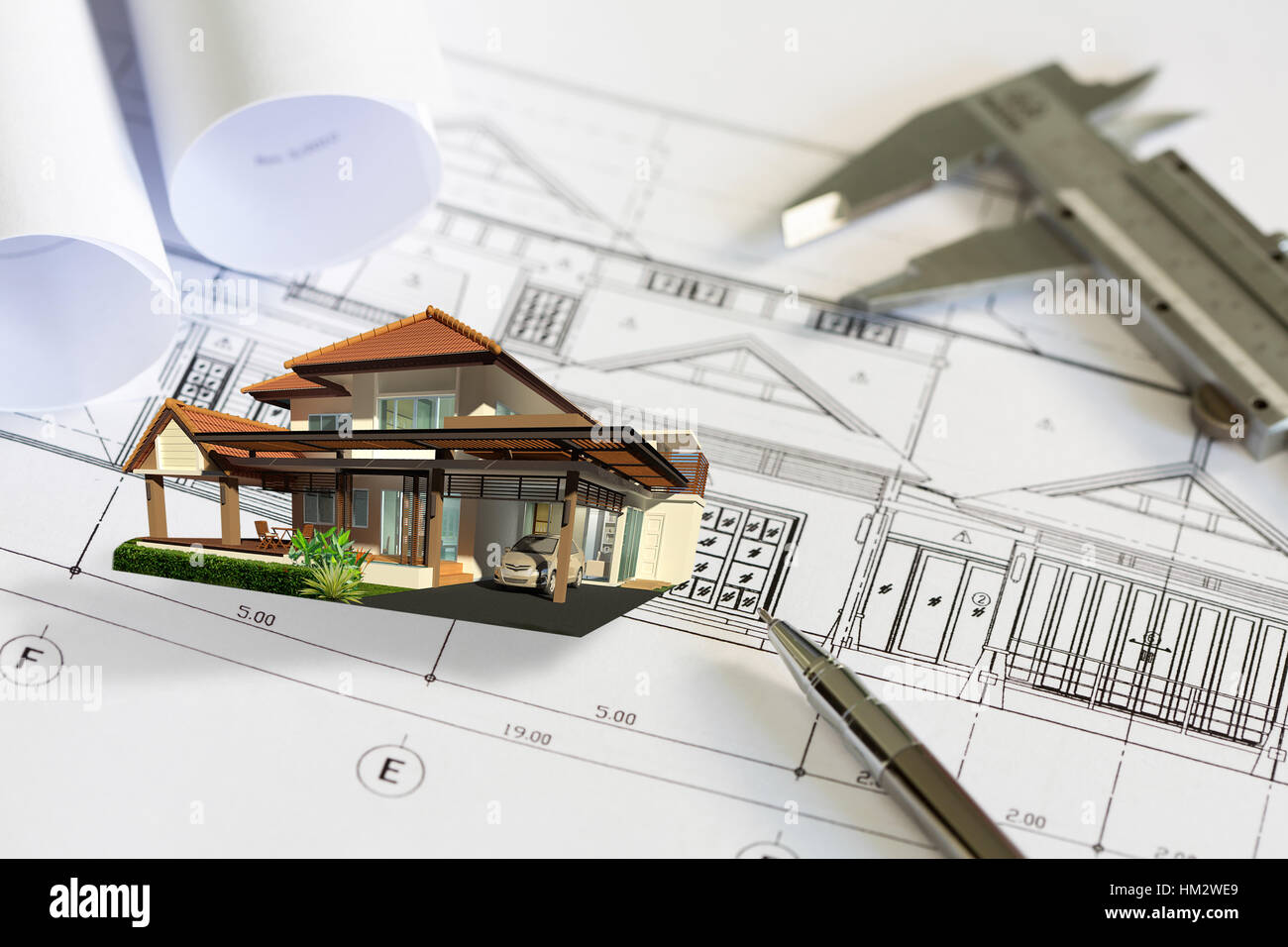 Construction plans and drawing tools on blueprints Stock Photo - Alamy