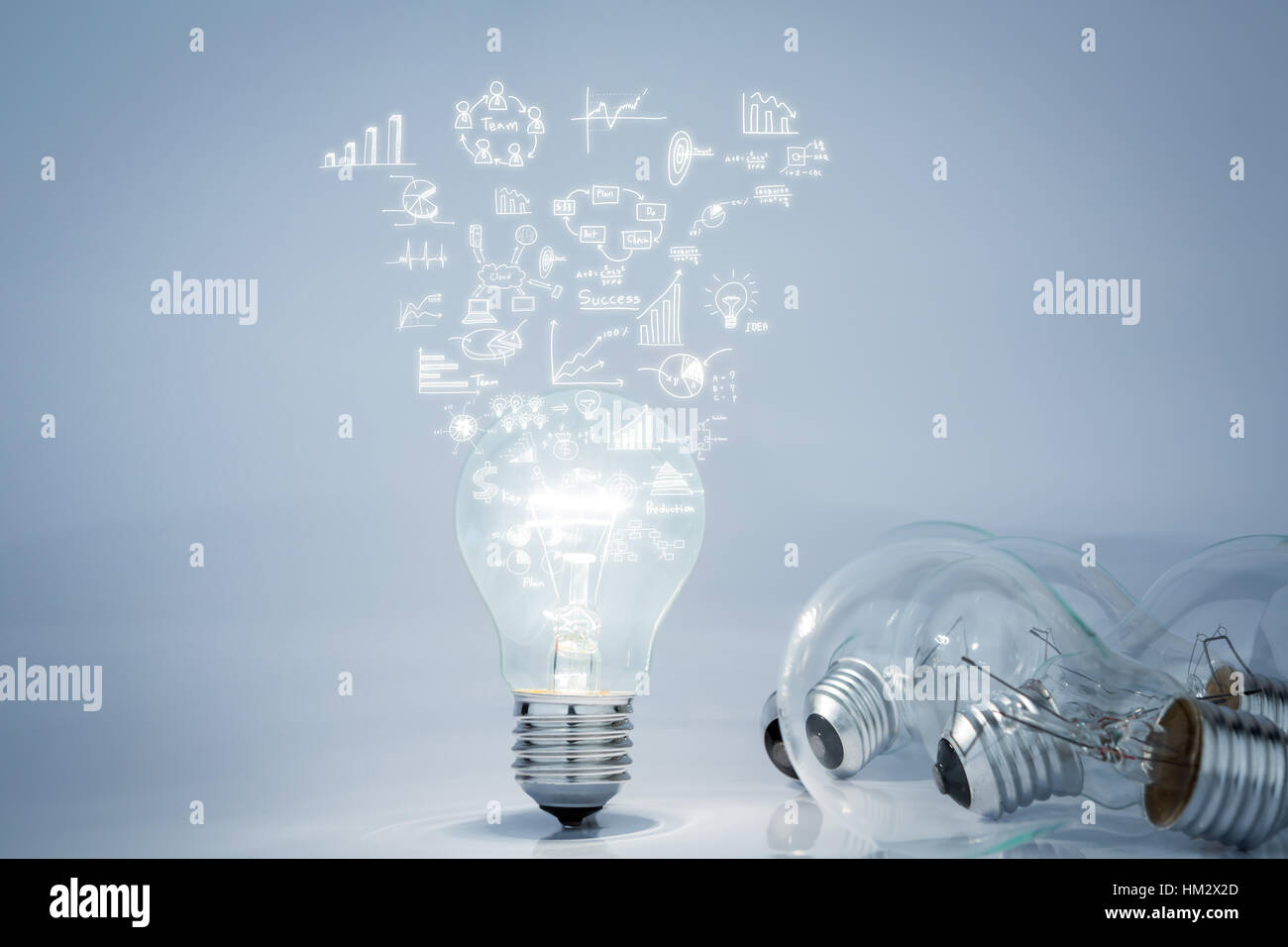 Light bulb with drawing graph Stock Photo - Alamy