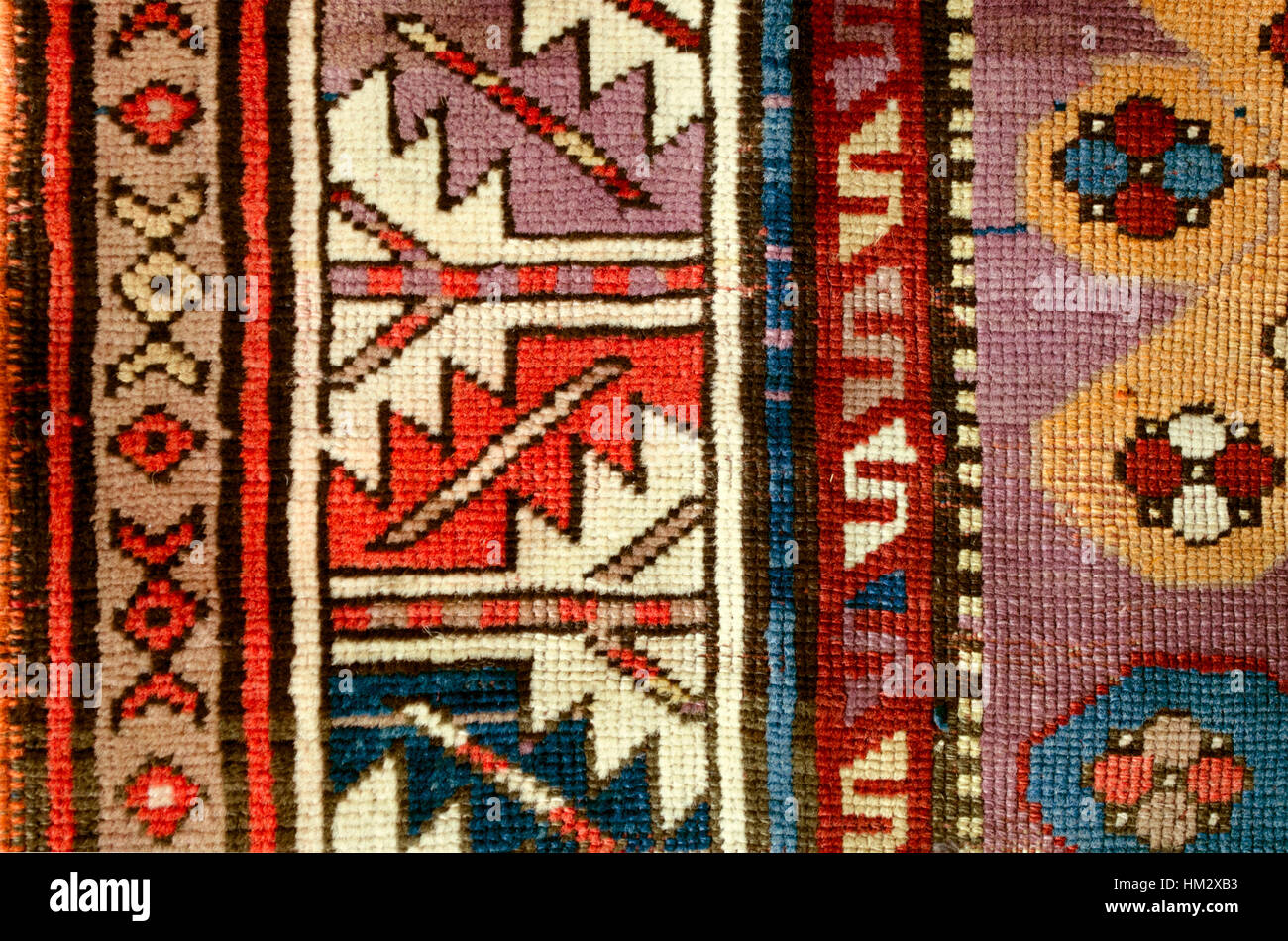 The edge ethnic woolen rug with sample of folk geometric ornaments ...