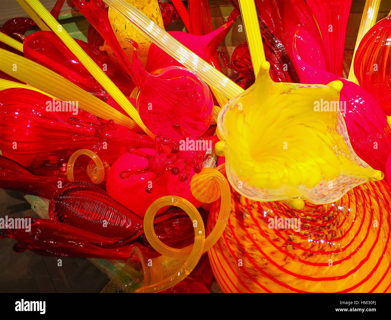 Red orange glass sculpture created by American artist Dale Chihuly ...
