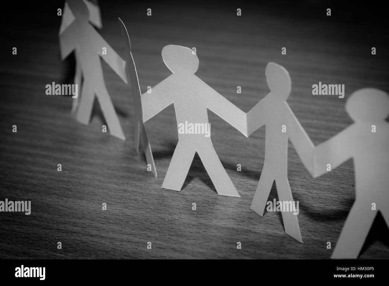 Table of people cut out Black and White Stock Photos & Images - Alamy