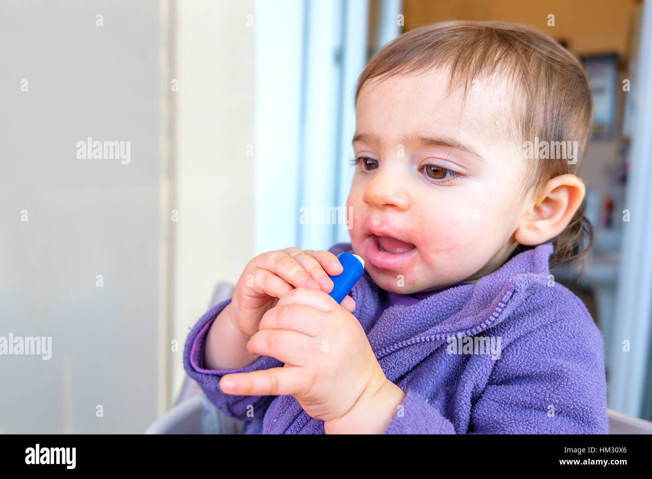 baby lip balm chapped lips cooled cracked dermatitis Stock Photo - Alamy