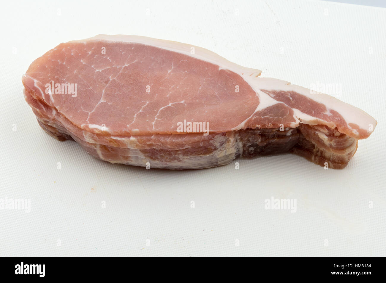 A stack of raw bacon rashers ready to be cooked Stock Photo - Alamy