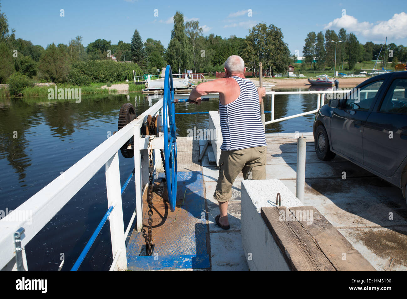 Cable ferry operated by an old man, Estonia Stock Photo - Alamy