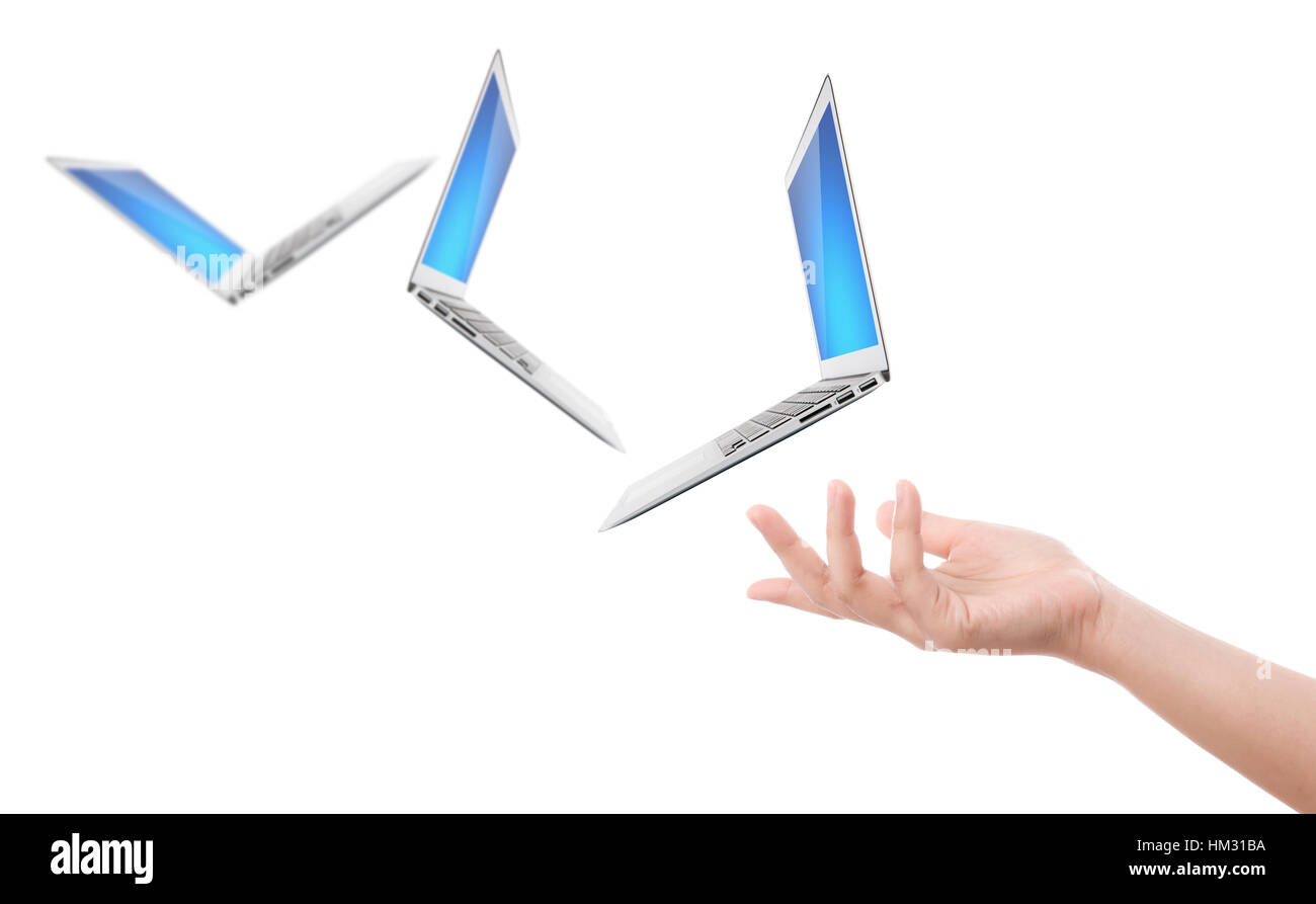 Hand holding laptop isolated on white background Stock Photo - Alamy