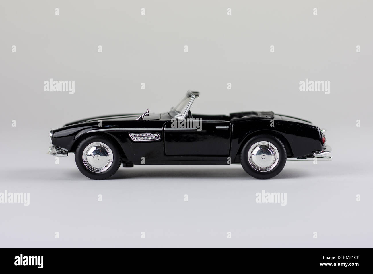 Closeup of black classic, elegant & vintage toy car Stock Photo - Alamy