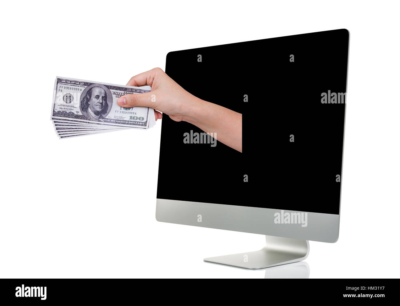 Getting money from Computer monitor Stock Photo - Alamy