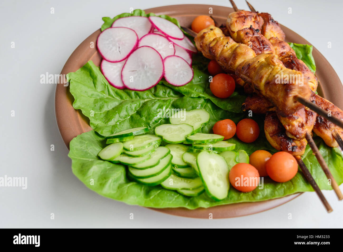 Chicken kebab with homemade yogurt and vegetables Stock Photo - Alamy