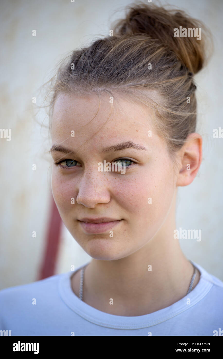 Portrait of a beautiful blond girl, Kihnu Island, Estonia Stock Photo ...