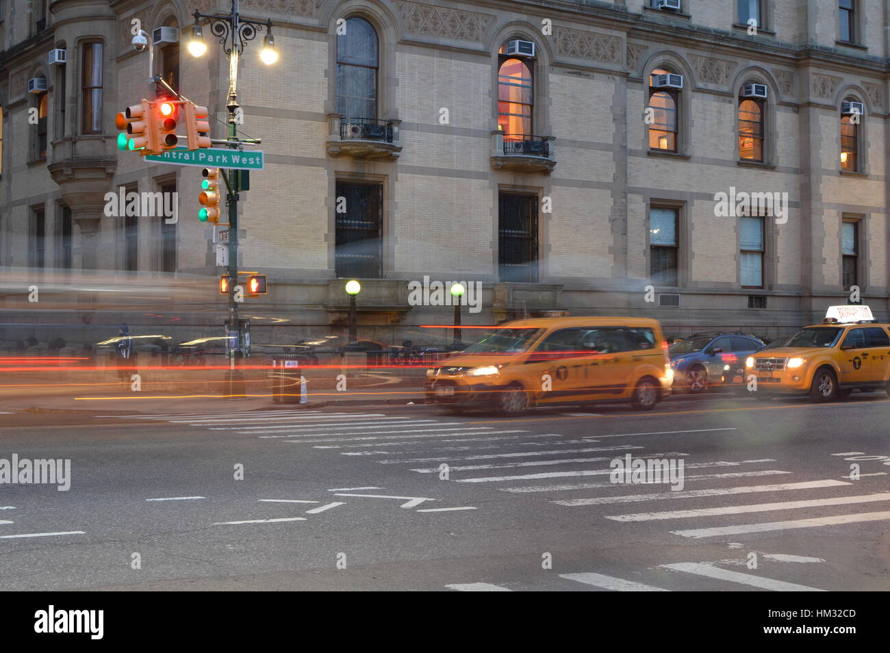 Street lights and traffic NYC at dusk - Central Park West Stock Photo ...