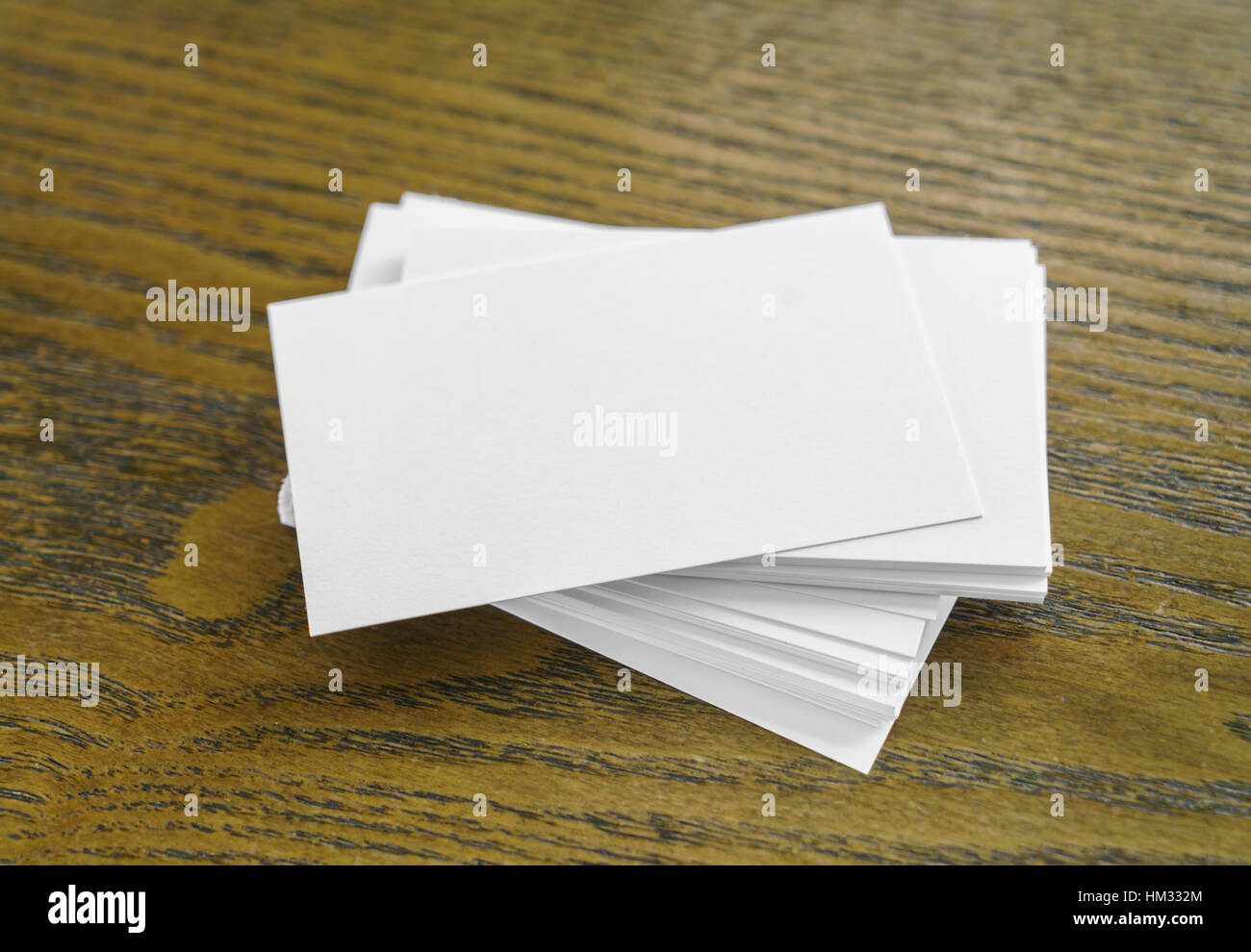 Business cards on wood table Stock Photo - Alamy