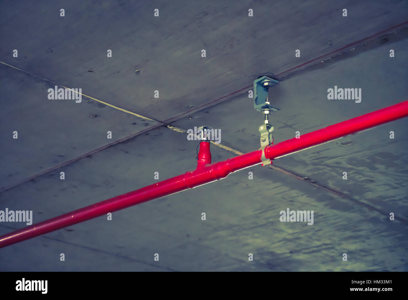 Fire sprinkler and red pipe ( Filtered image processed vintage effect ...