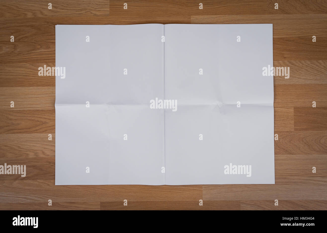Blank Newspaper with empty space mock up on wood background Stock Photo ...