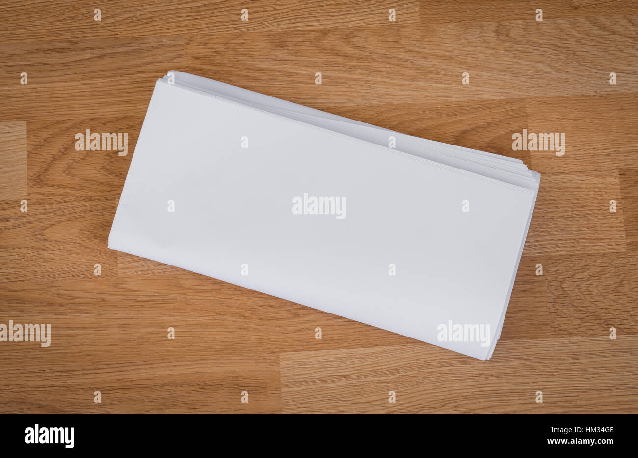 Blank Newspaper with empty space mock up on wood background Stock Photo ...