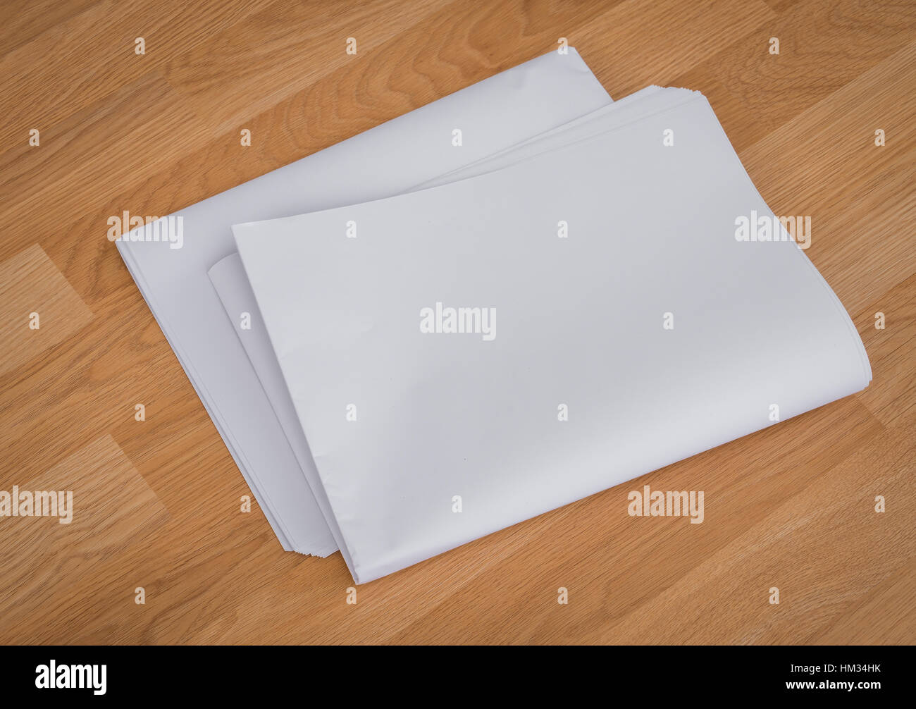 Blank Newspaper with empty space mock up on wood background Stock Photo ...