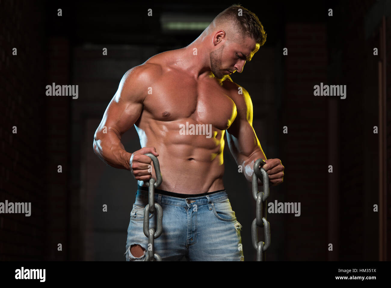 Muscle man chain hi-res stock photography and images - Alamy
