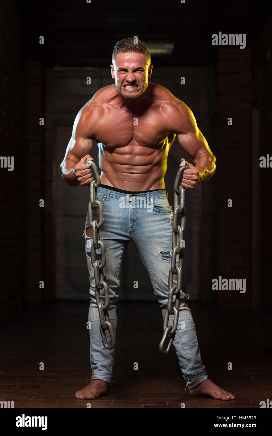 Muscular man chain hi-res stock photography and images - Alamy