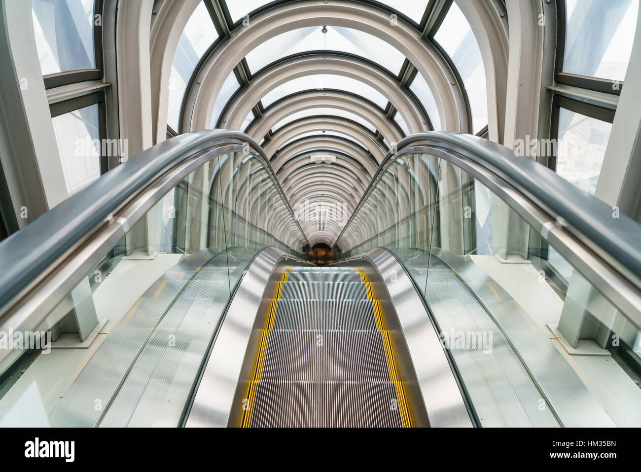 Escalator in modern building Stock Photo - Alamy