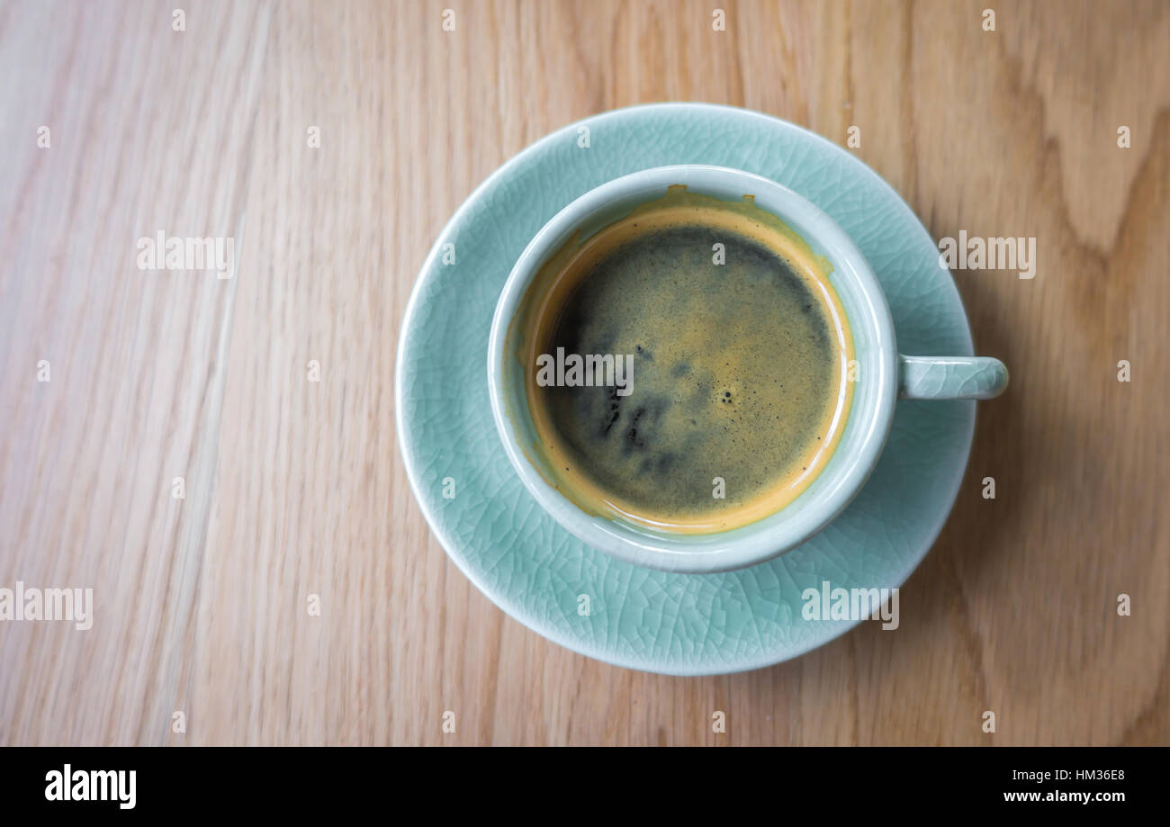 Espresso Coffee cup on wood table Stock Photo - Alamy