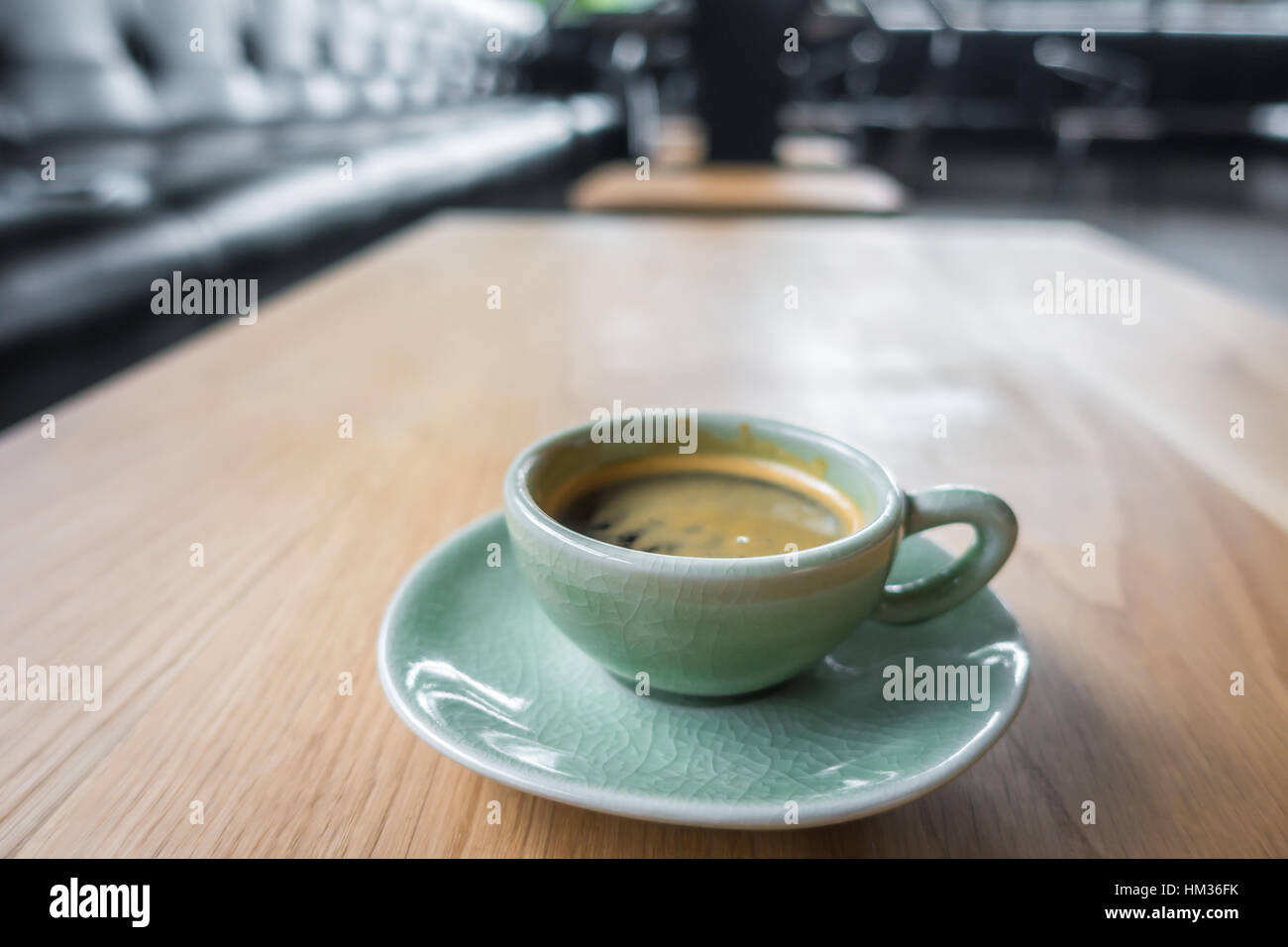Espresso Coffee cup on wood table Stock Photo - Alamy