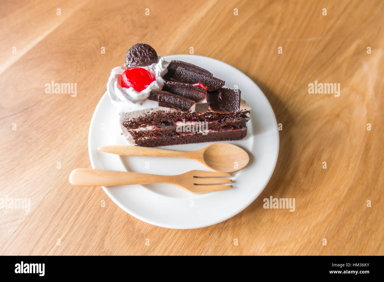 Chocolate cake with red cherries Stock Photo - Alamy