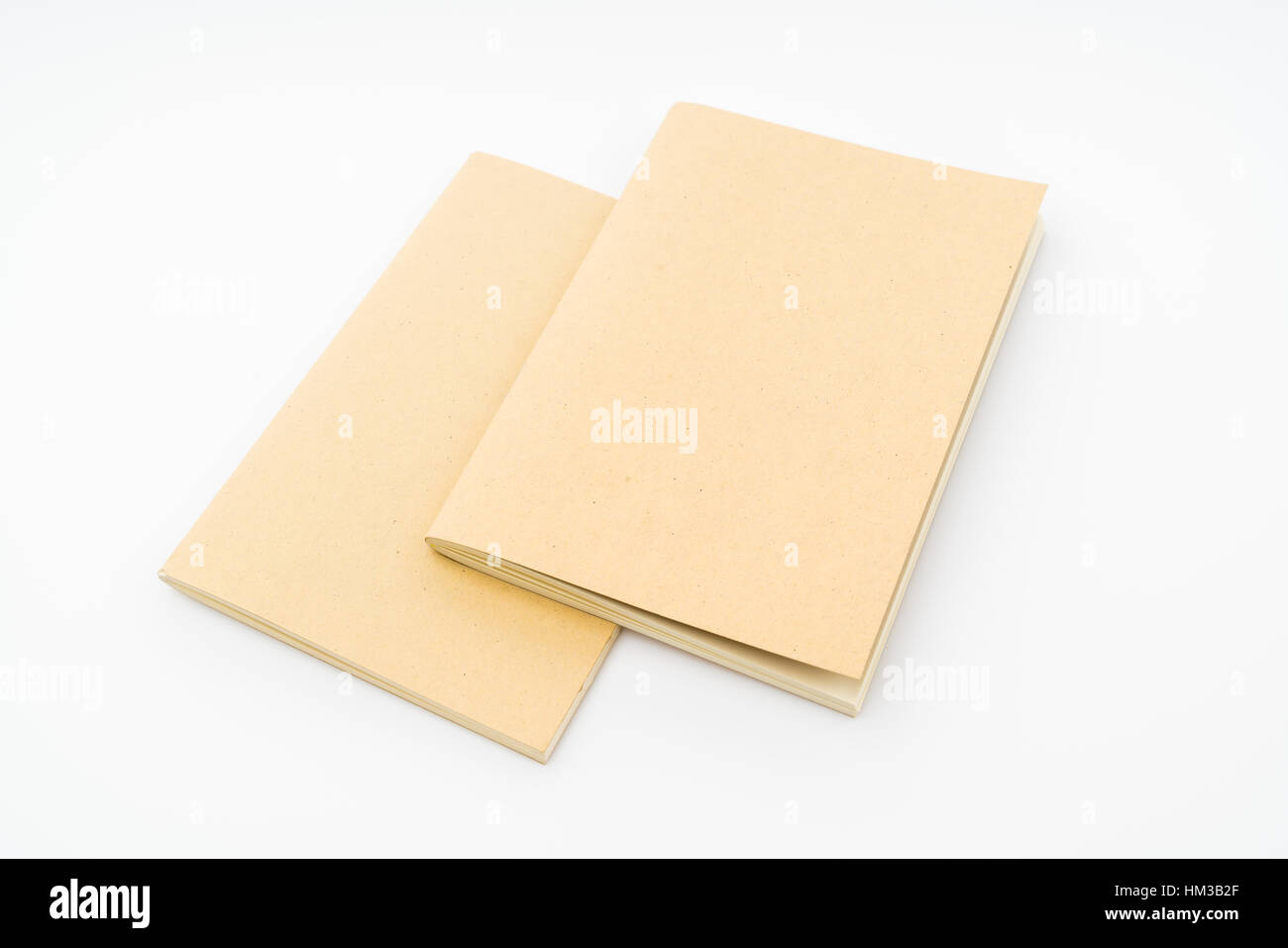 Recycled paper book on white background Stock Photo - Alamy