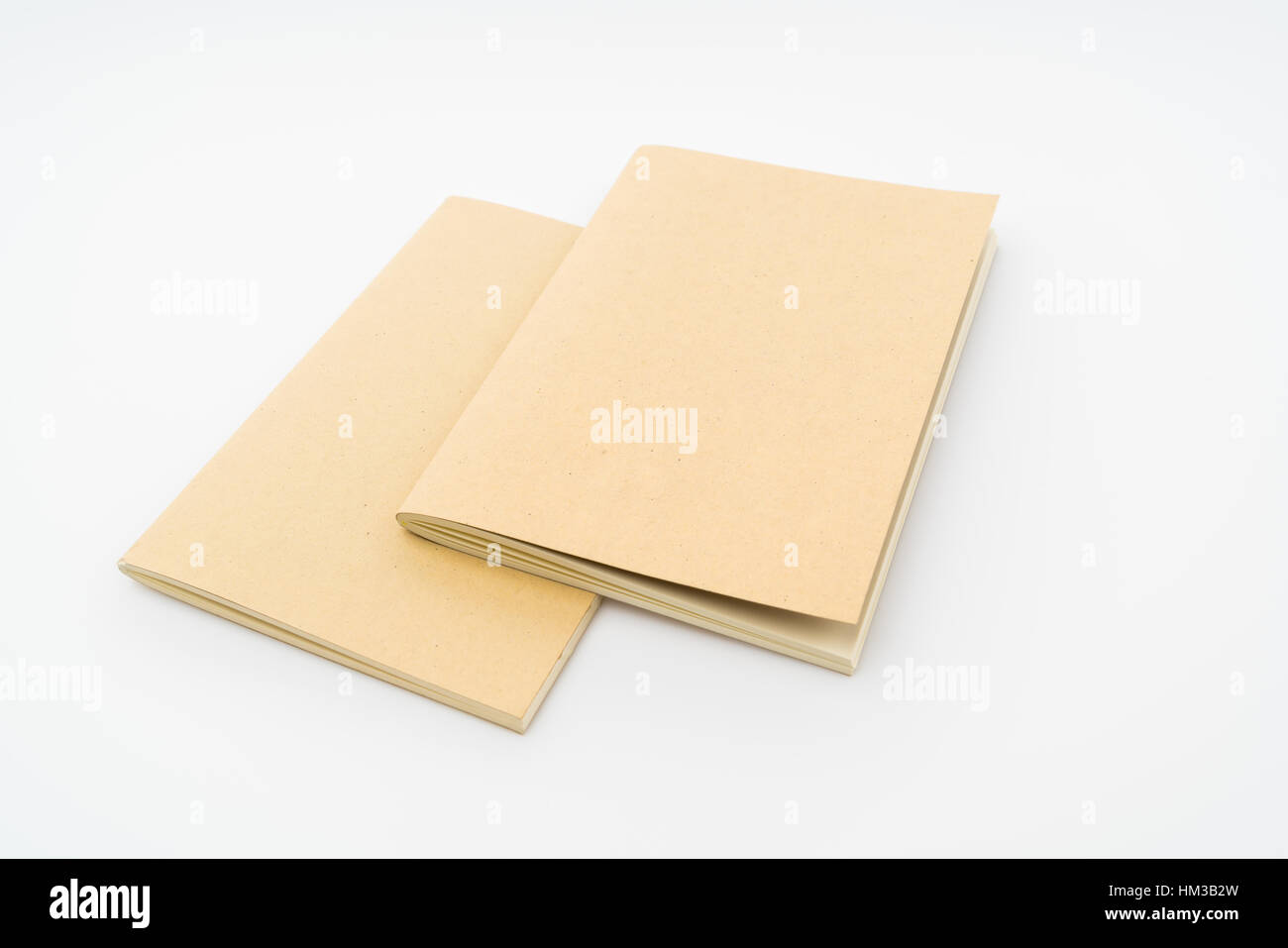 Recycled paper book on white background Stock Photo - Alamy