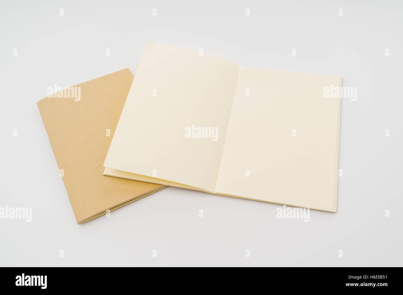 Recycled paper book on white background Stock Photo - Alamy