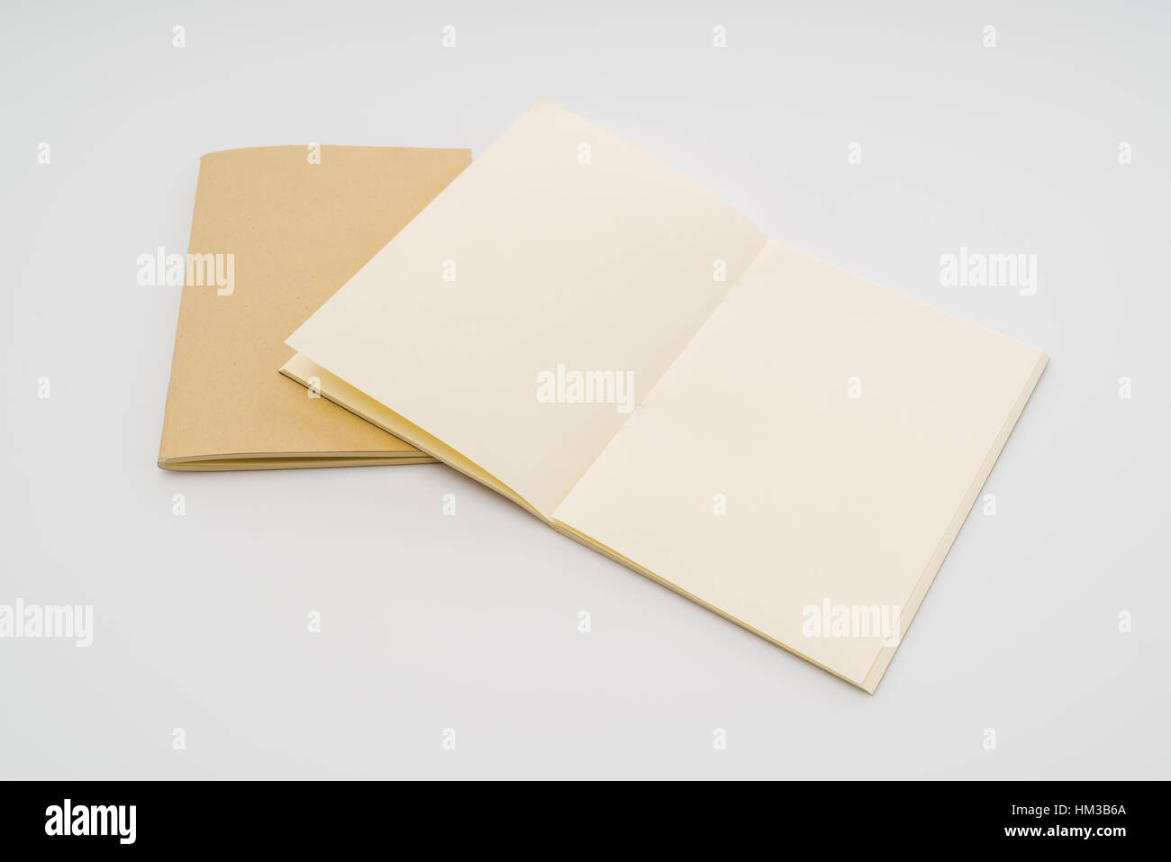Recycled paper book on white background Stock Photo - Alamy