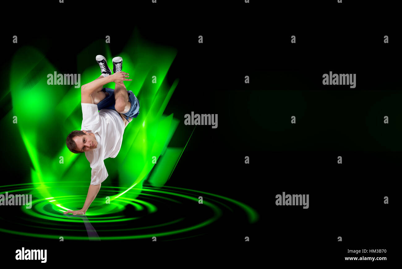 Breakdancer standing on hand Stock Photo - Alamy