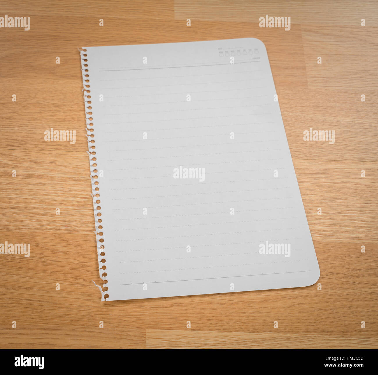 White note book paper on wooden desk Stock Photo - Alamy