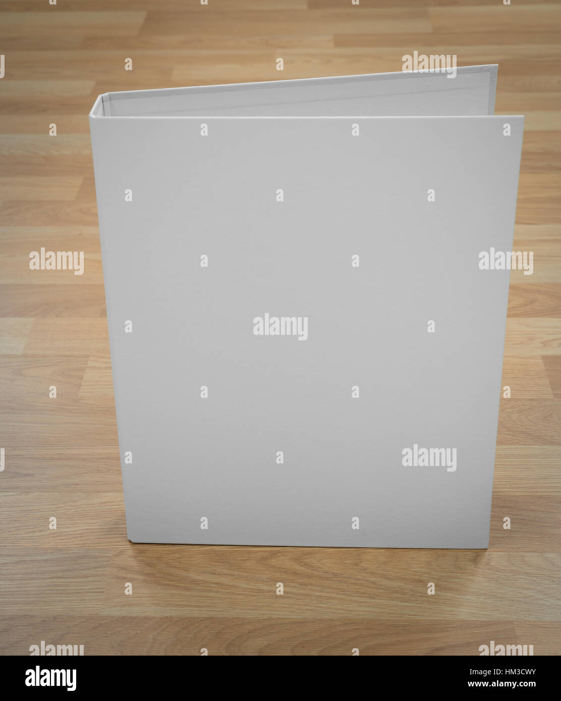 White folder on wood Stock Photo - Alamy