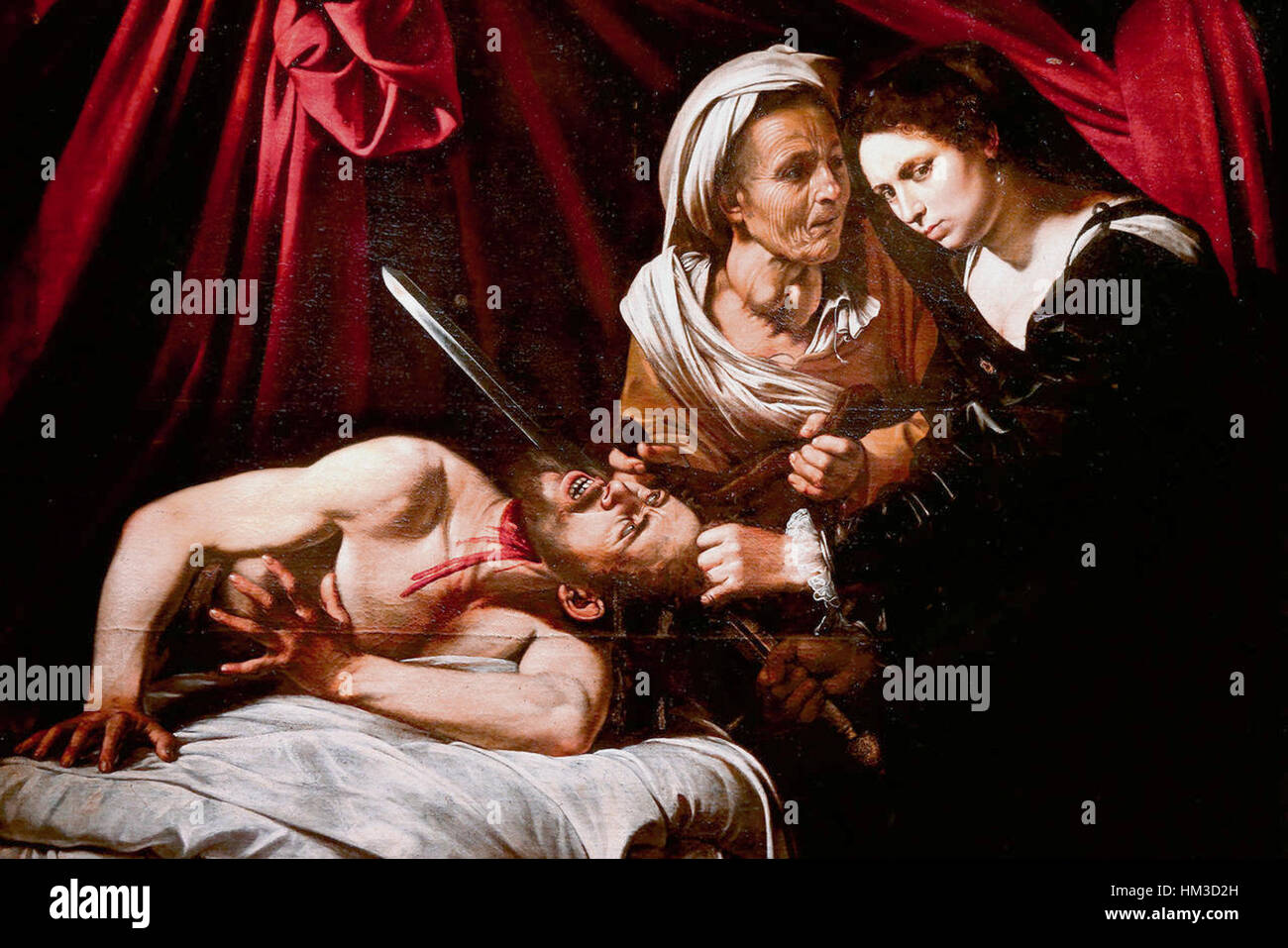 This dramatic oil painting, attributed to Caravaggio, depicts the ...