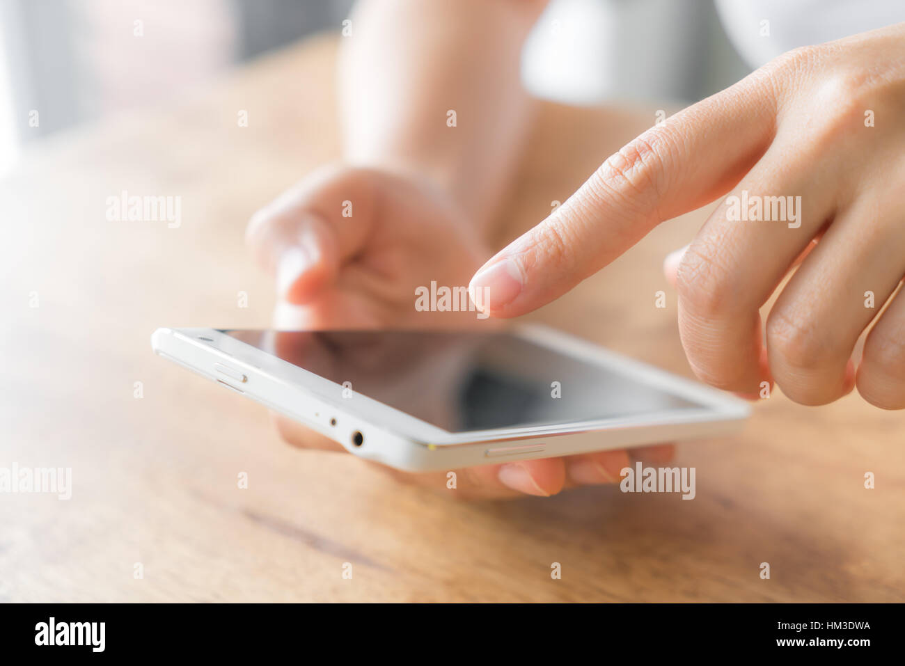 Hand touch the Screen on the Smart Phone Stock Photo - Alamy