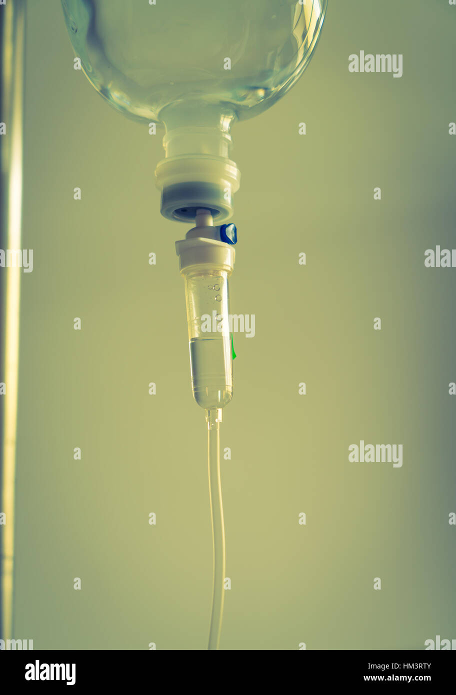 Infusion bottle with IV solution ( Filtered image processed vintage ...