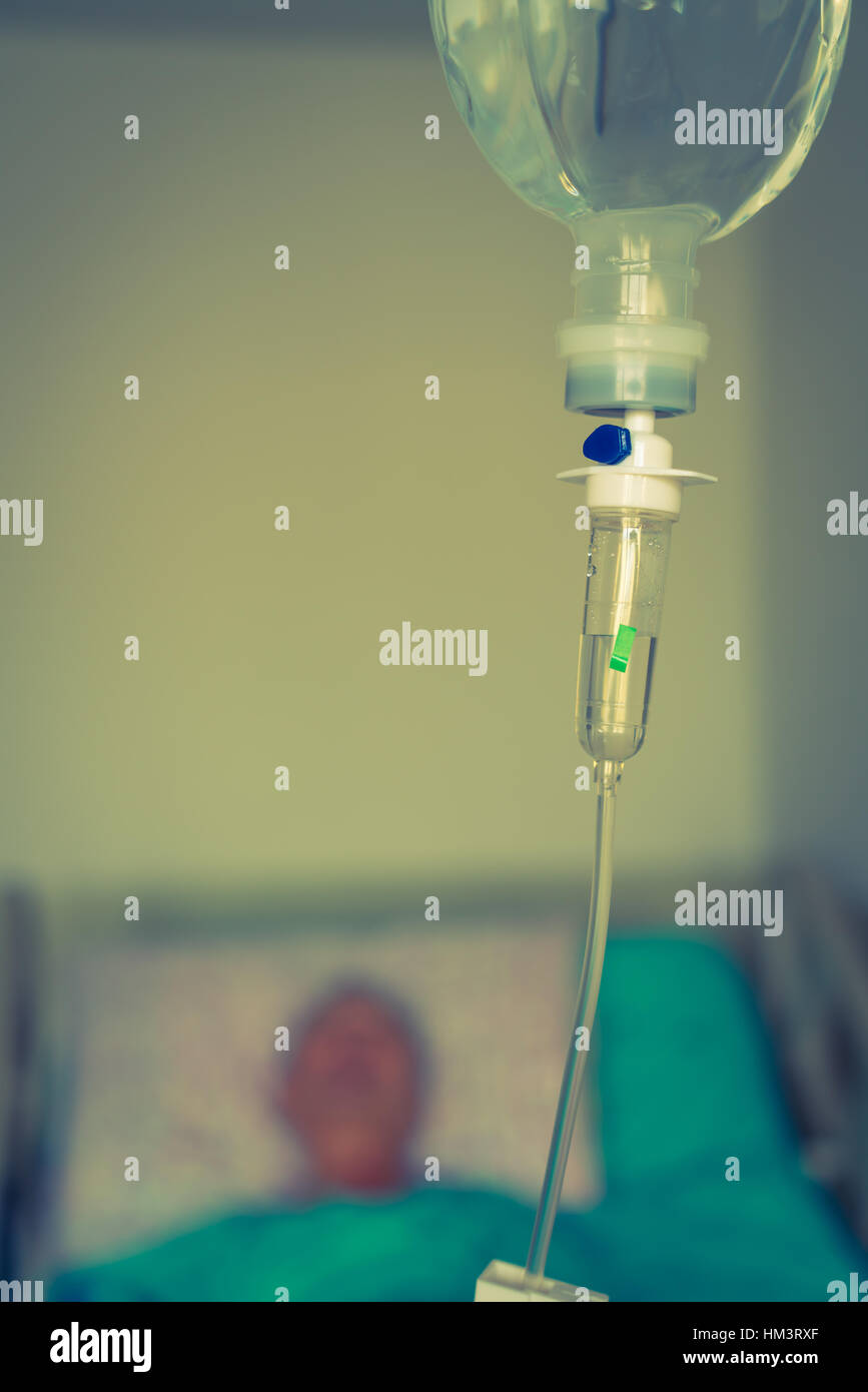 Infusion bottle with IV solution ( Filtered image processed vintage ...