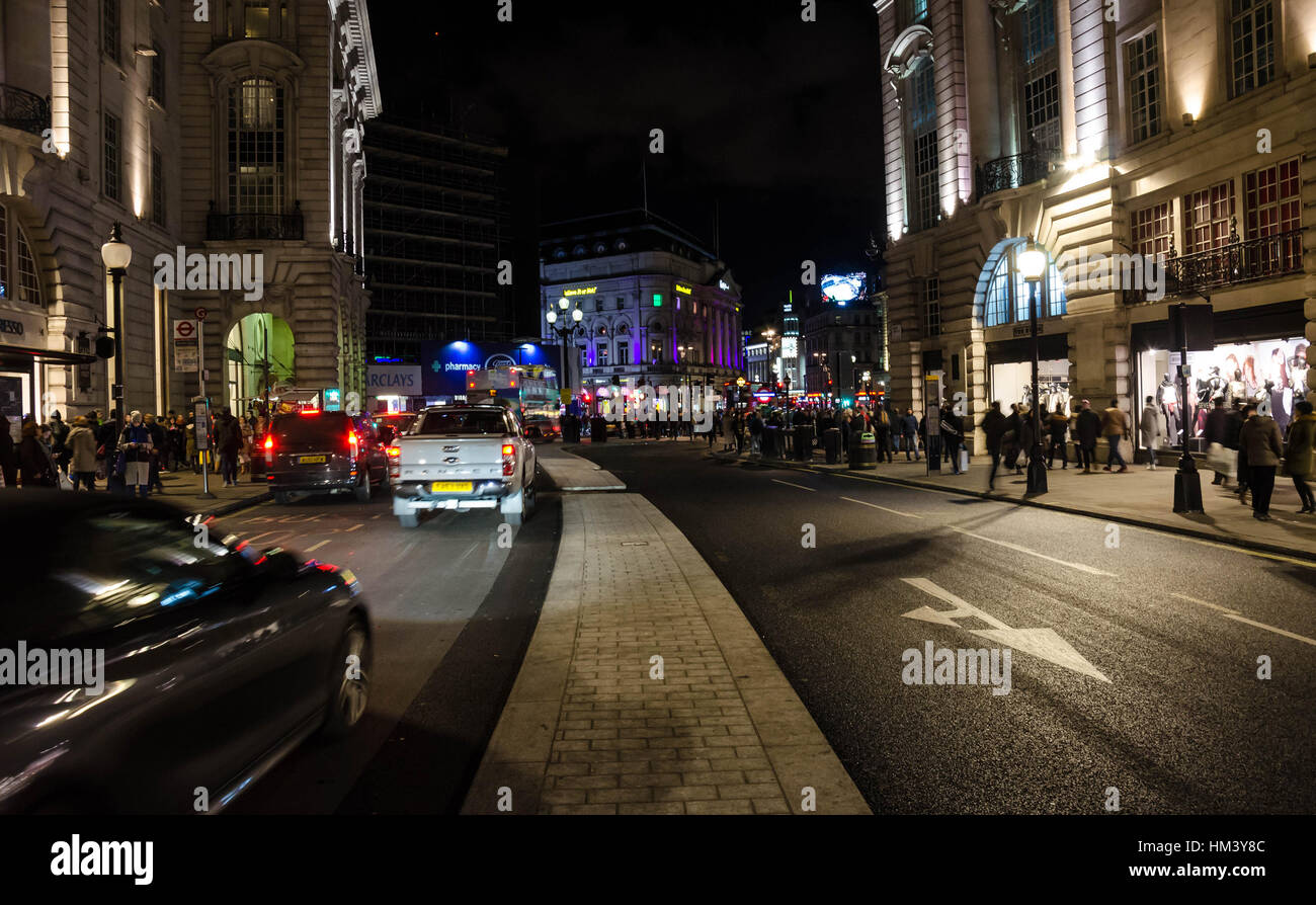 Looking down Regent Street at night towards Piccadilly Circus in London ...