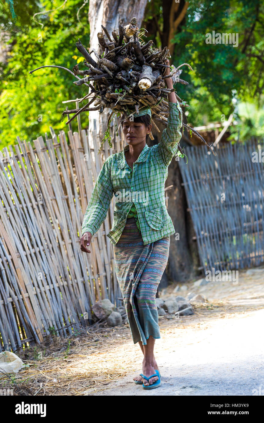 CHAUNG-U, MYANMAR - DECEMBER 01, 2016 : burmesse farmer woman walking ...