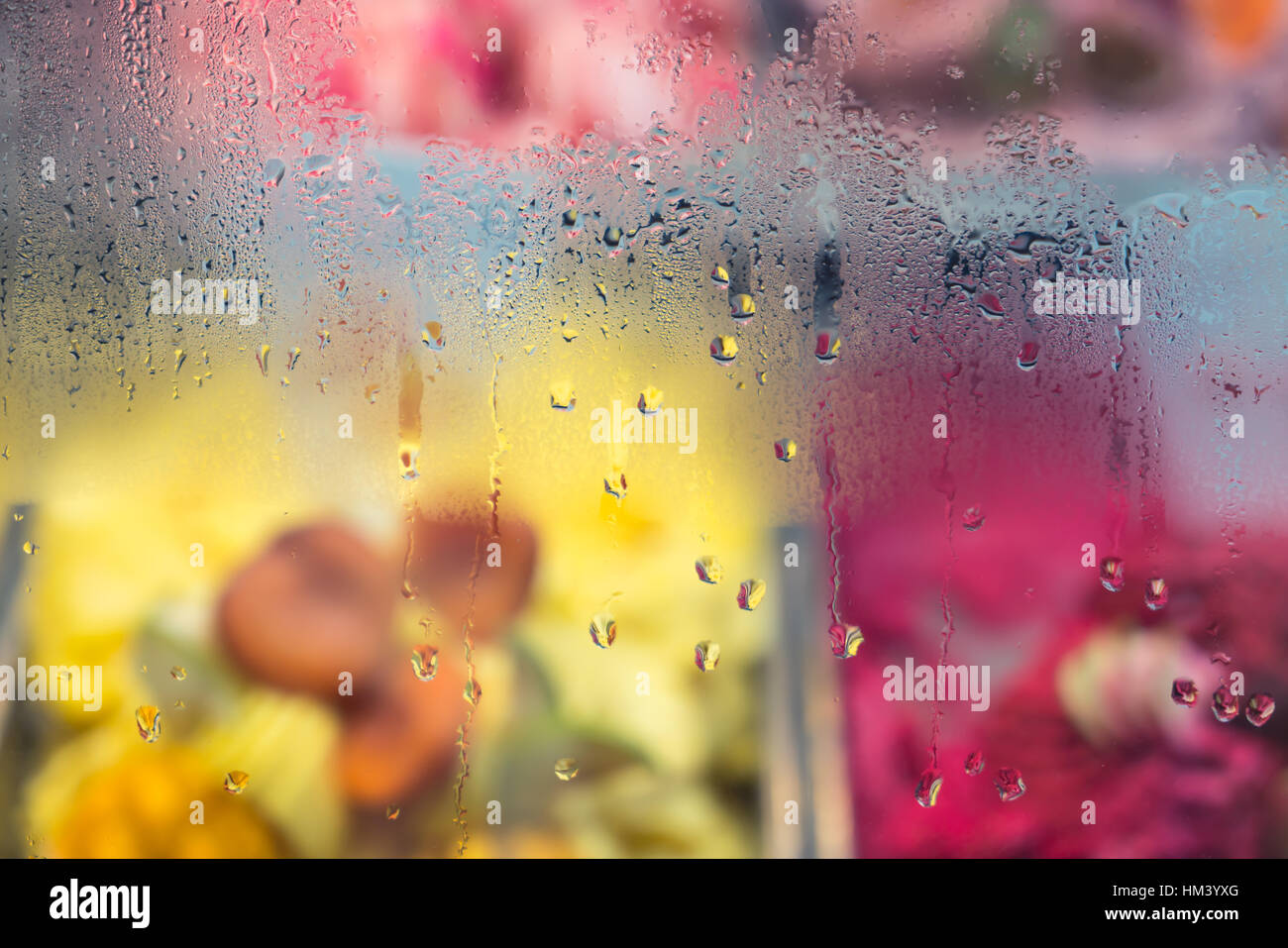 Water drop over Fresh fruits ice cream background Stock Photo - Alamy