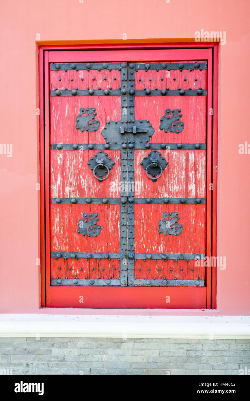 Chinese red wooden decorated door for background Stock Photo - Alamy