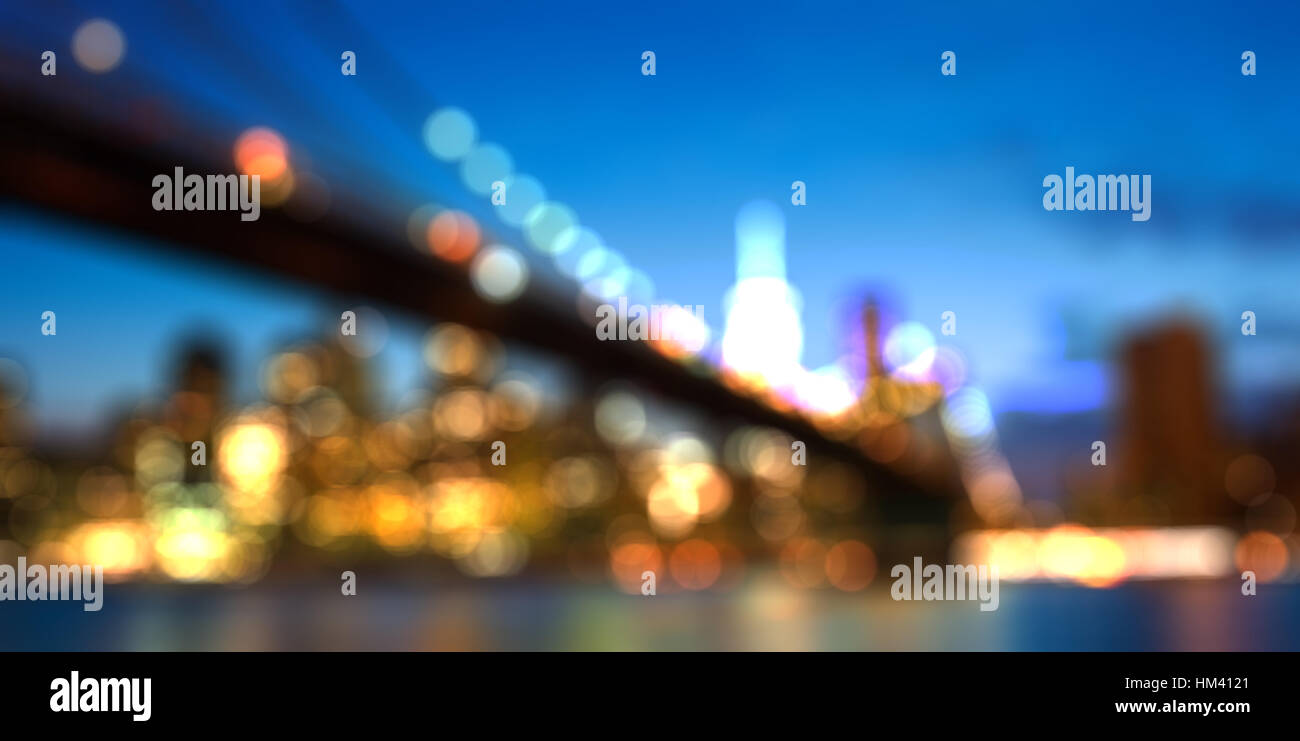 Blurred cityscape of New york city skyline by night from Brooklyn Stock ...